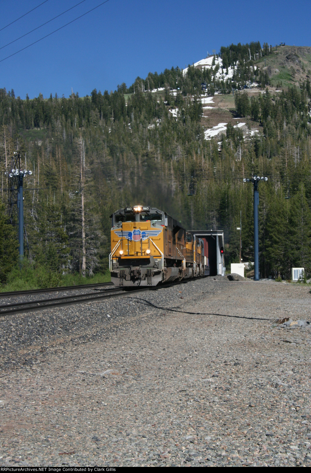 UP 8613 west coming out of the "Big Hole" (tunnel 41)